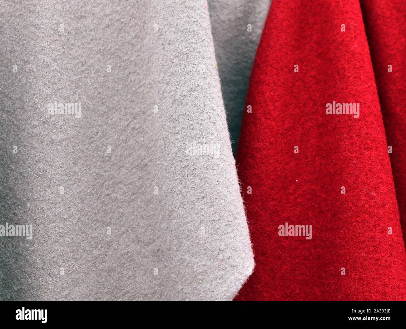 Highly detailed close up view on colorful textile and fabric textures ...