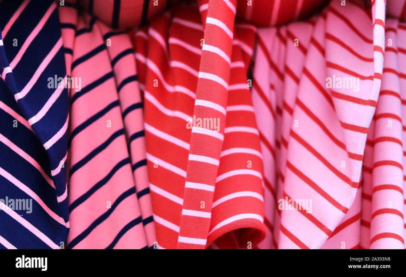 Highly detailed close up view on colorful textile and fabric textures ...