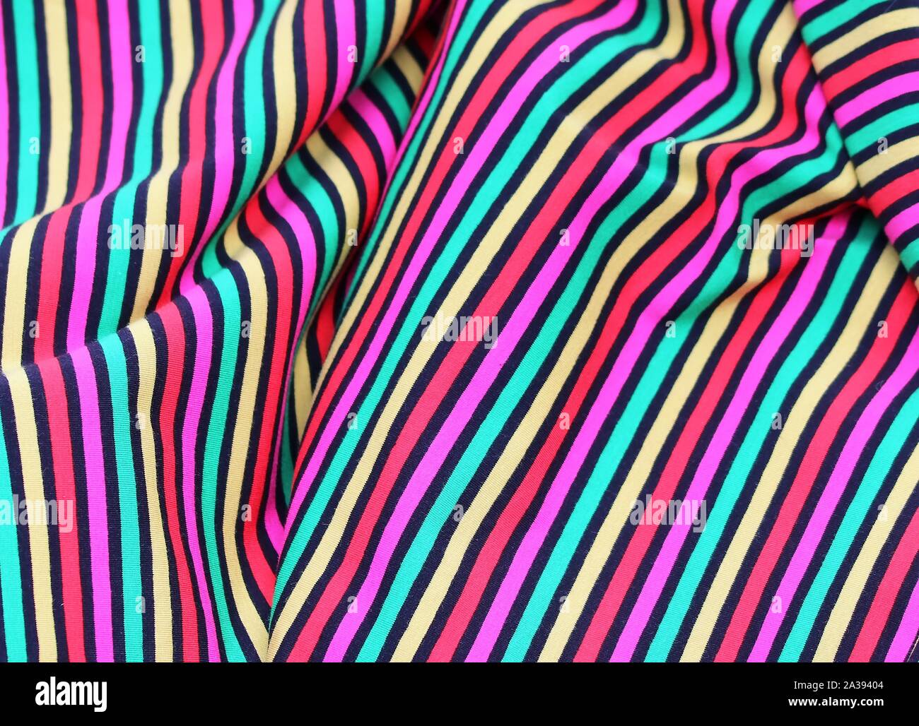 Highly detailed close up view on colorful textile and fabric textures ...