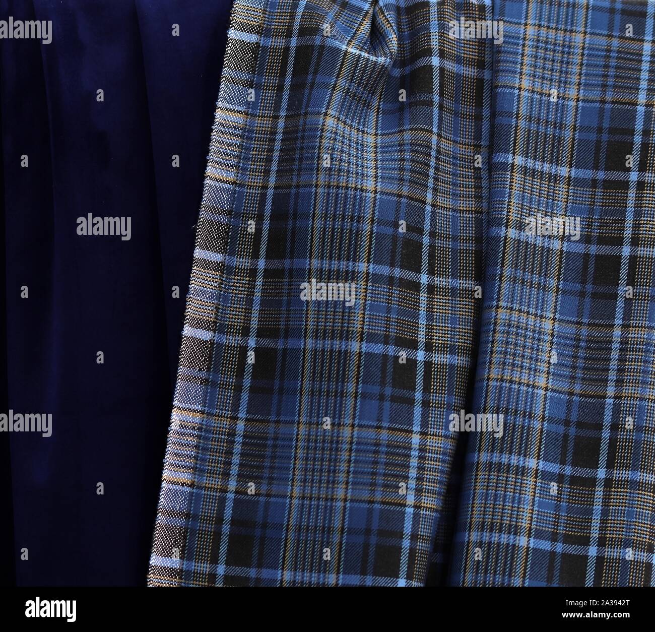 Highly detailed close up view on colorful textile and fabric textures ...