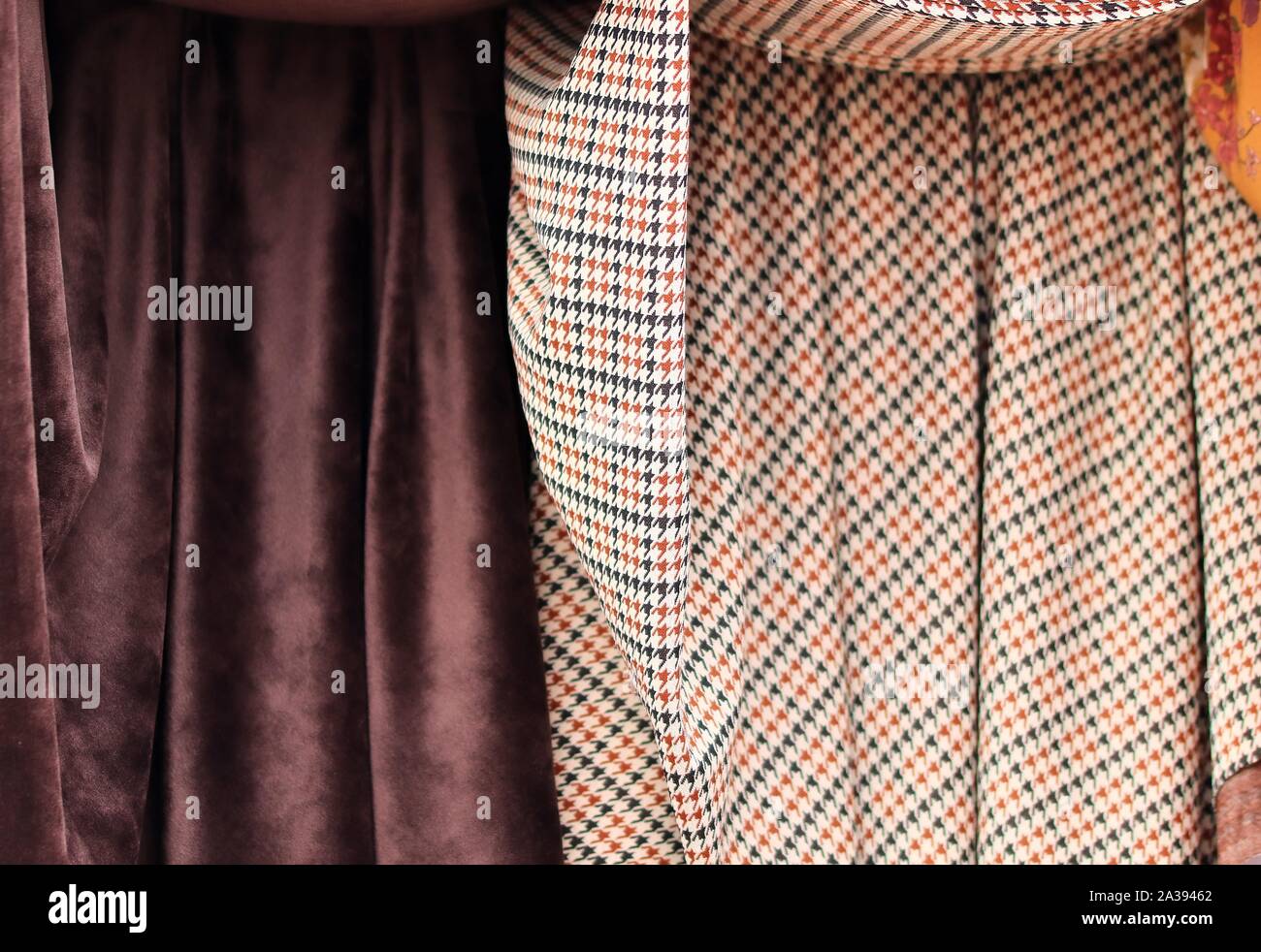 Highly detailed close up view on colorful textile and fabric textures ...