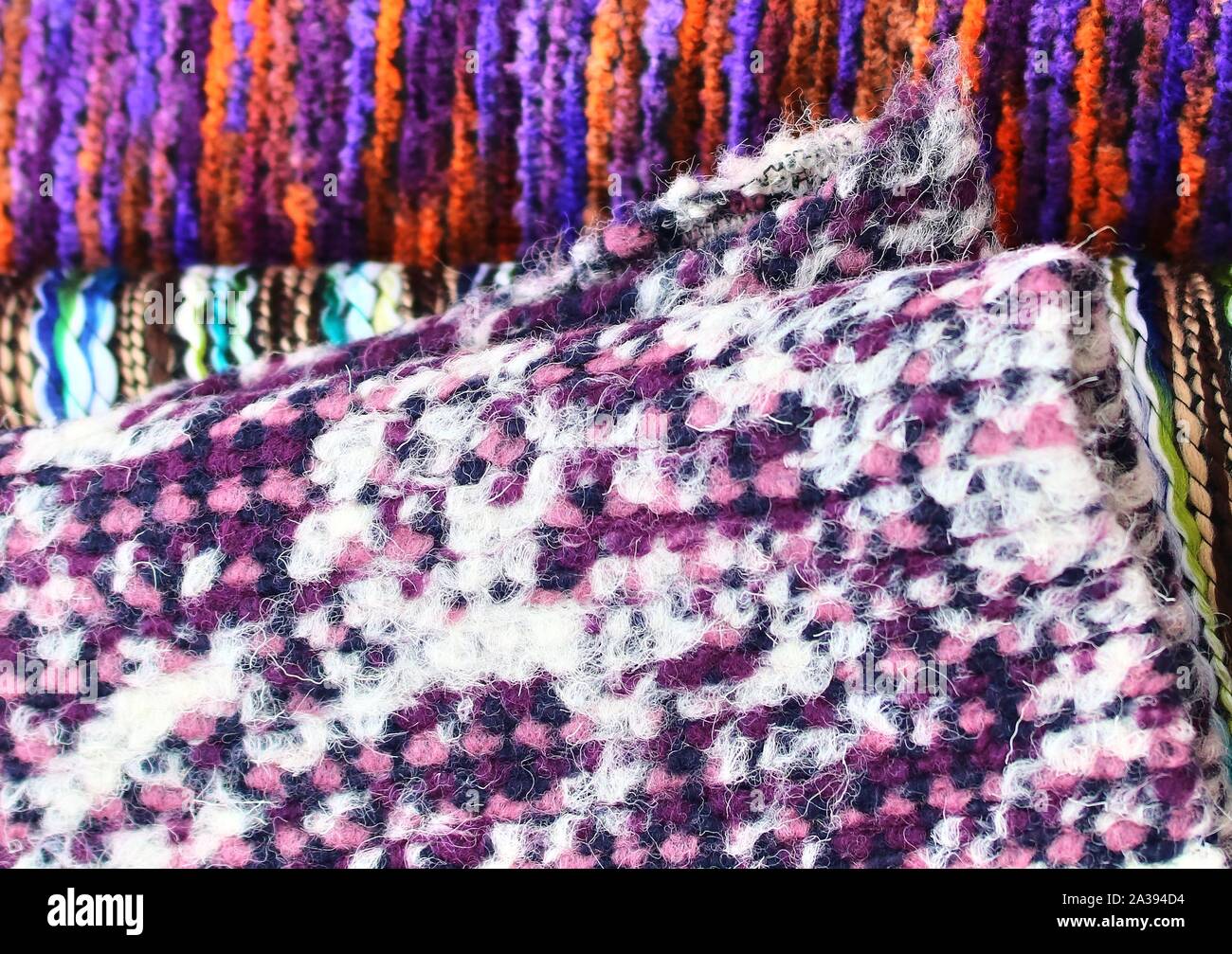 Highly detailed close up view on colorful textile and fabric textures ...