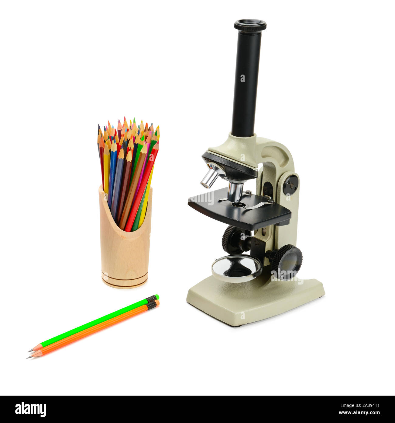laboratory microscope and set of pencils isolated on white background ...