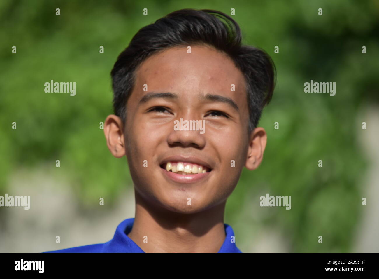 A Filipino Male Youngster Smiling Stock Photo - Alamy