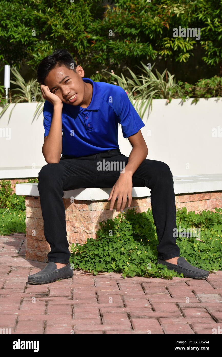 An Unhappy Filipino Boy Youth Stock Photo - Alamy