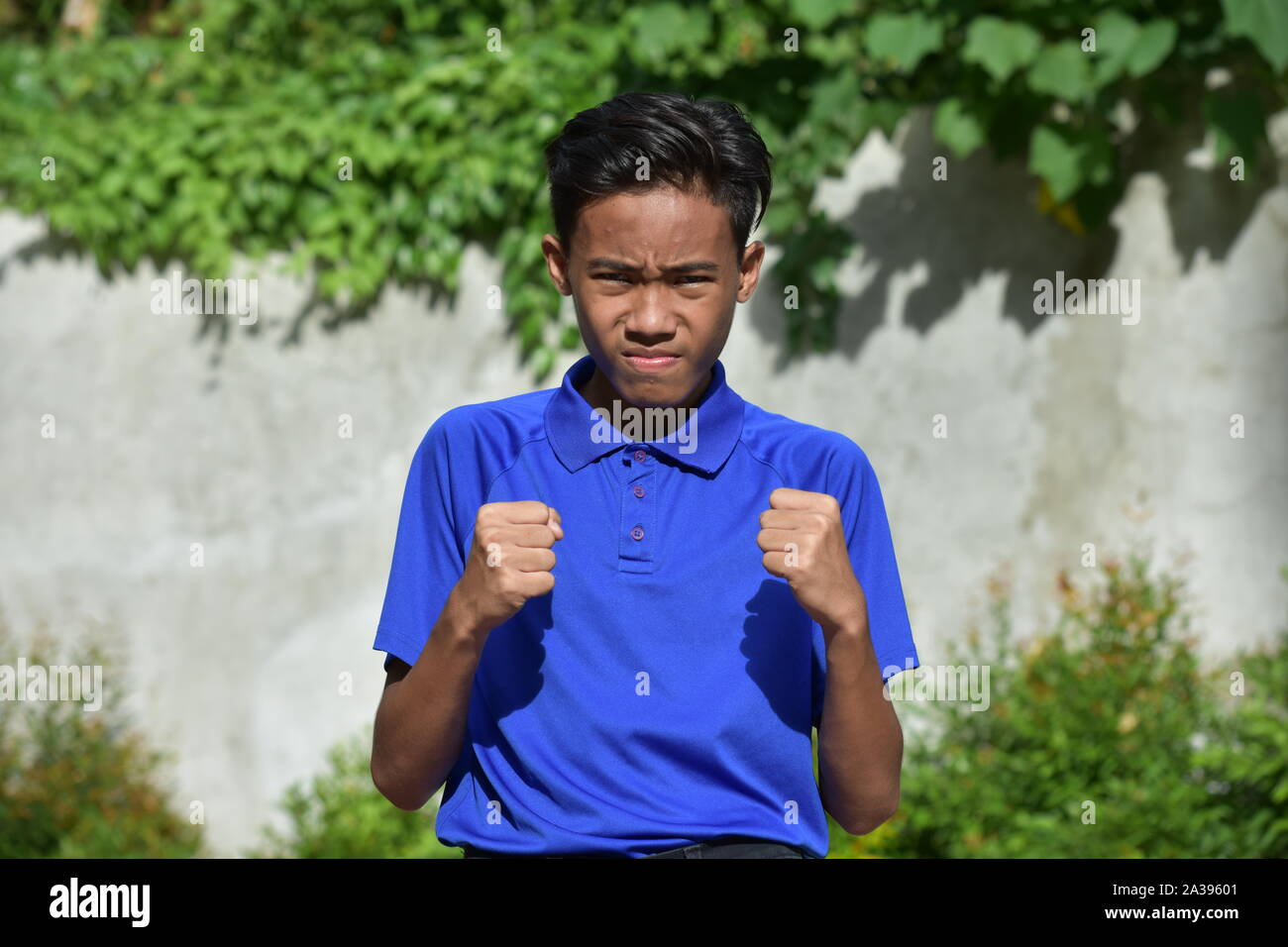 Angry teenager boy hi-res stock photography and images - Alamy