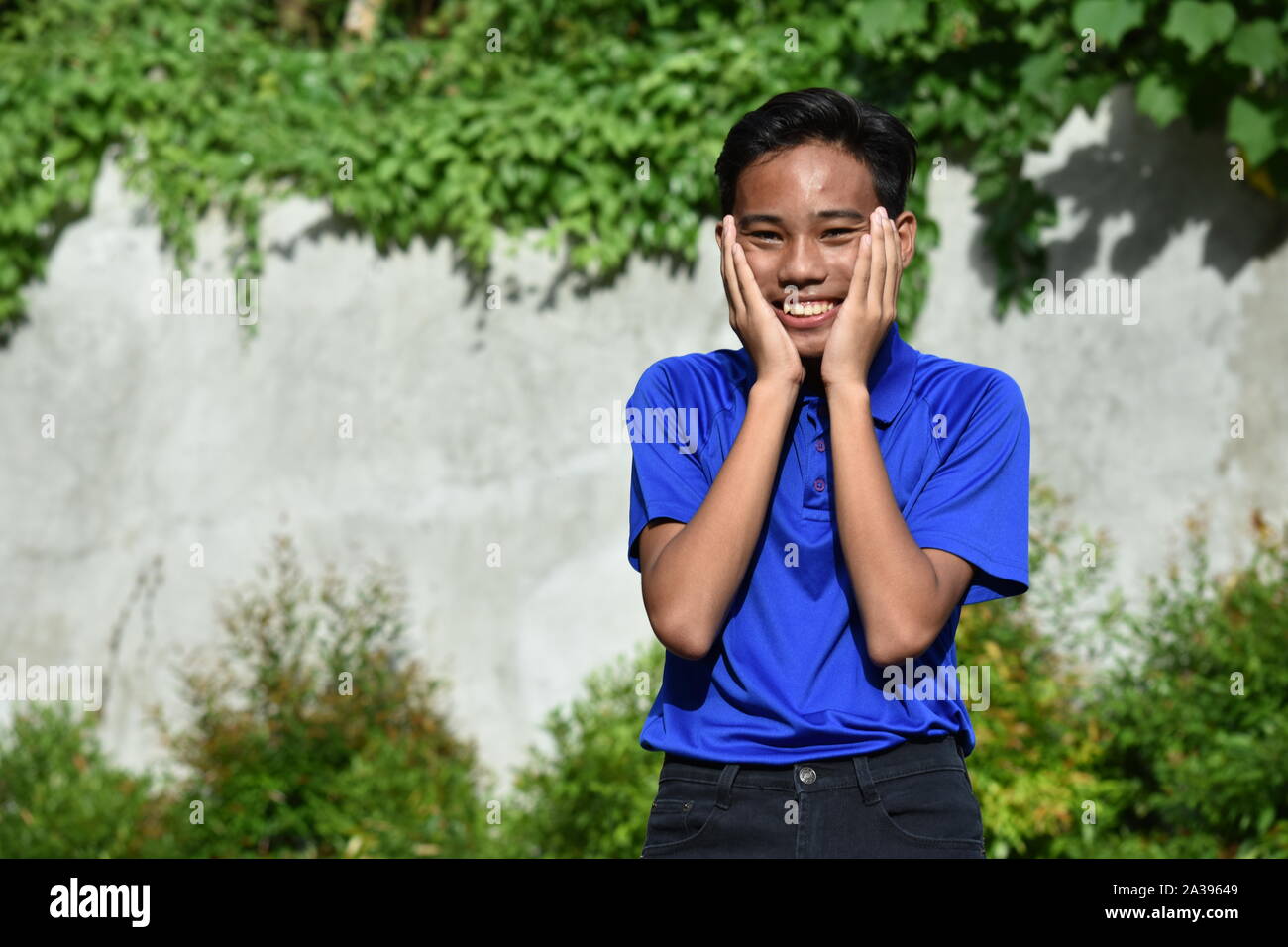 A Surprised Young Filipino Teenager Boy Stock Photo - Alamy