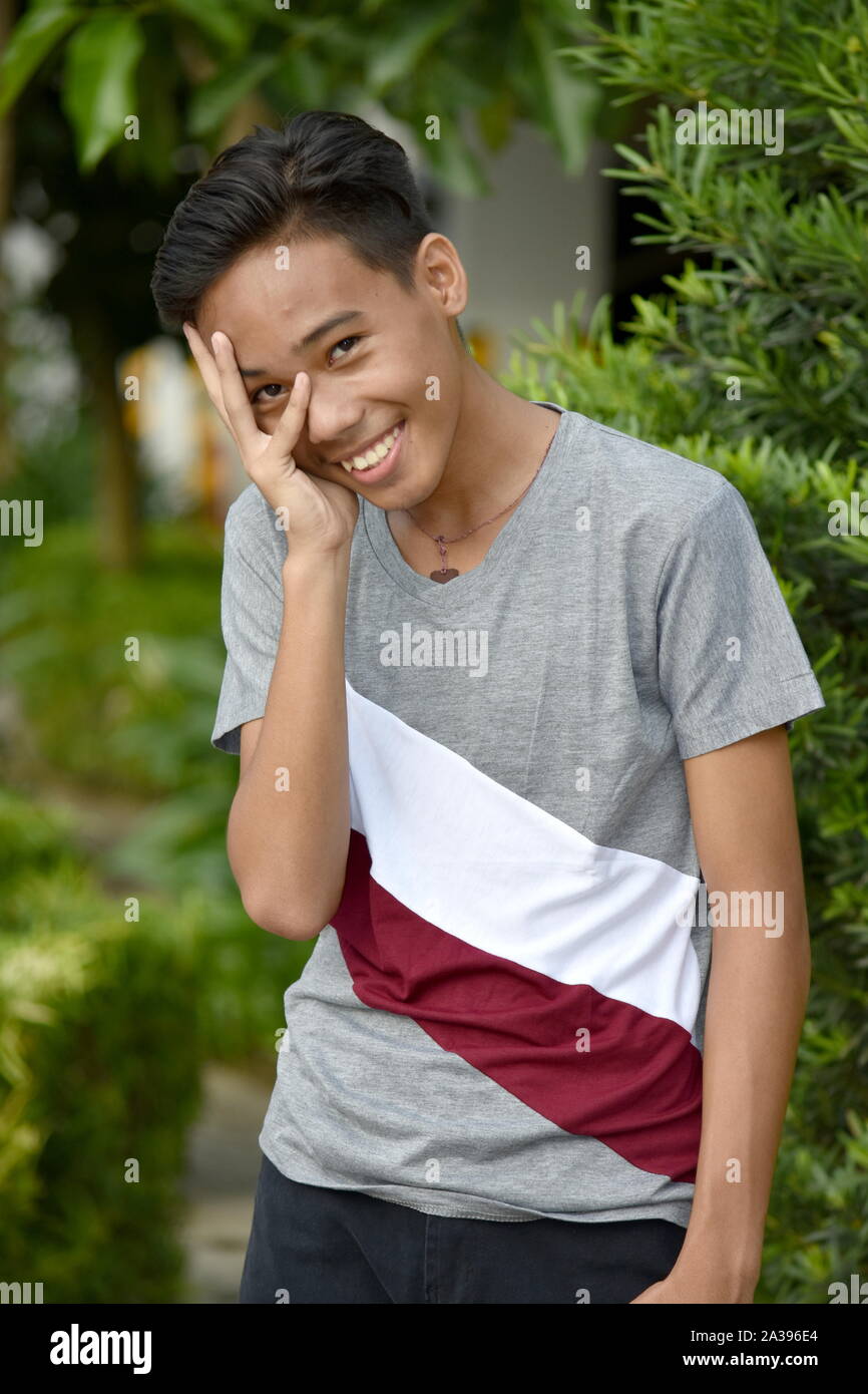 An A Laughing Handsome Teenager Stock Photo - Alamy