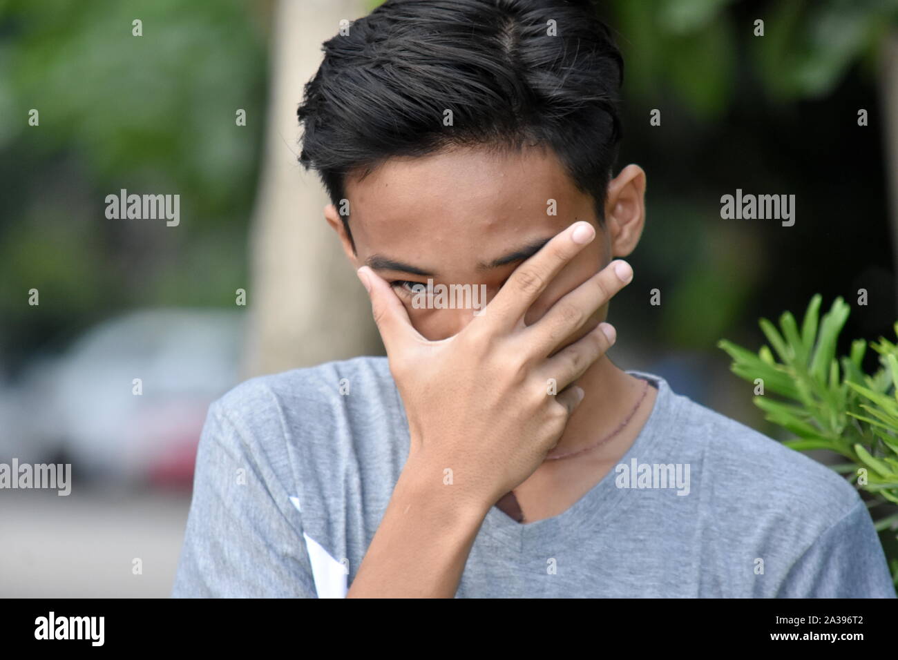 A Stressed Young Filipino Male Stock Photo - Alamy