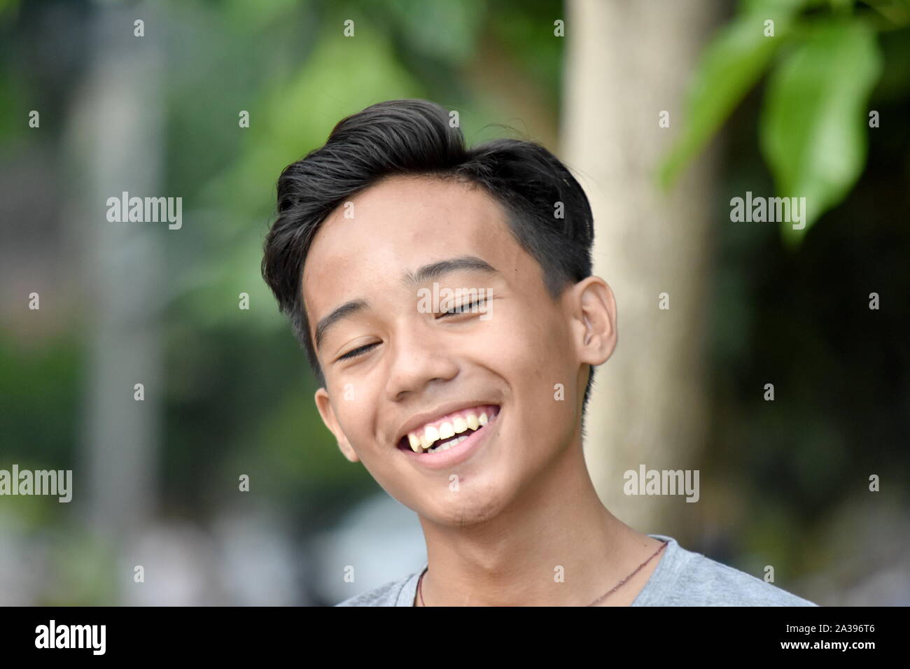 Smiling males hi-res stock photography and images - Alamy
