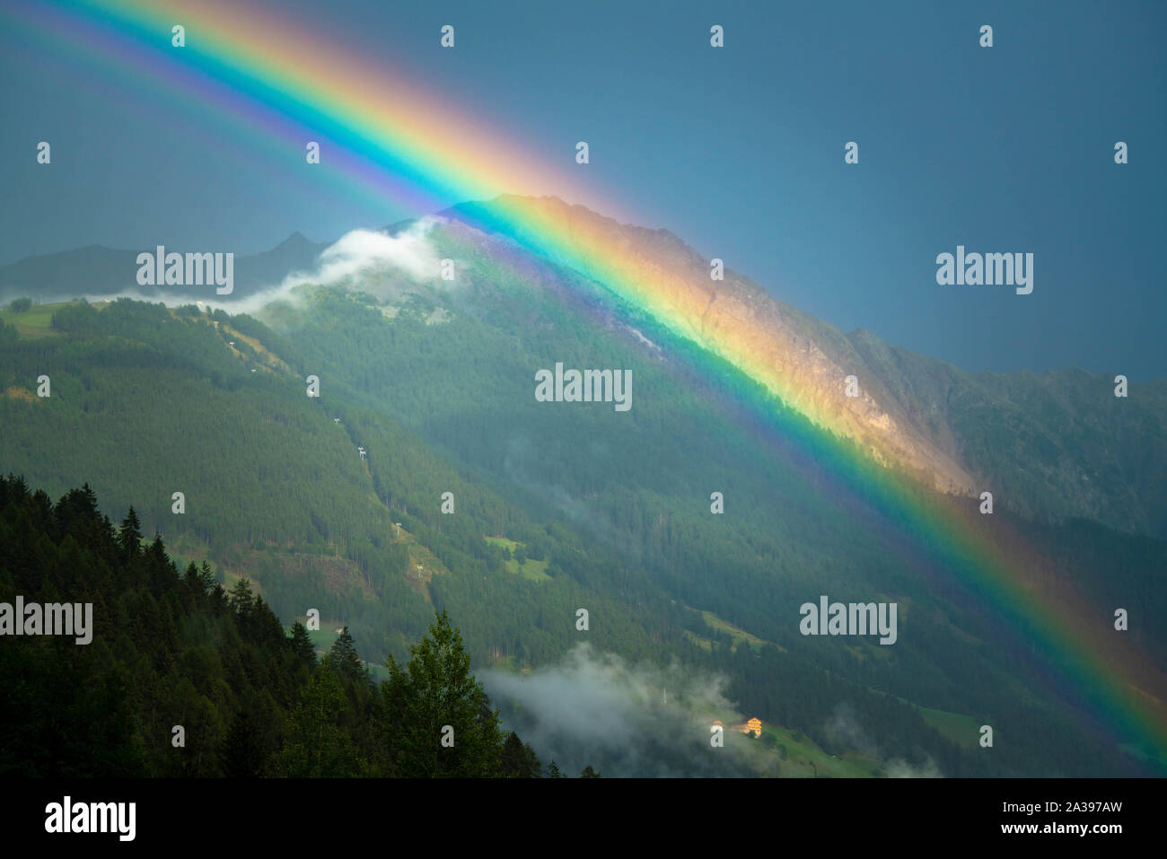 Rainbow over lush alpine landscape, Lienz, Austria Stock Photo - Alamy