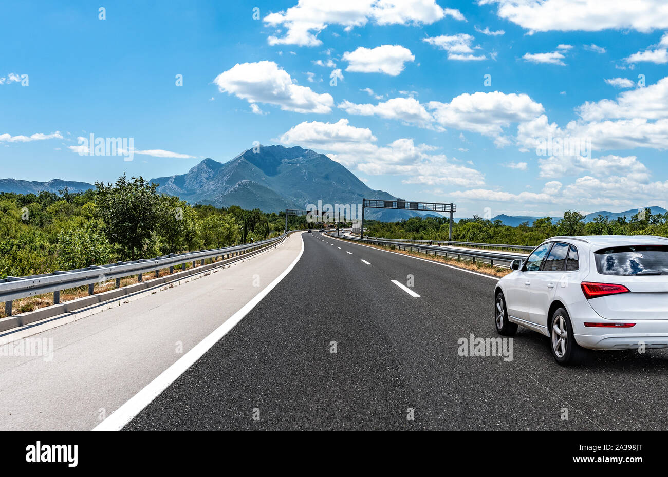 Car moves on mountain road hi-res stock photography and images - Alamy