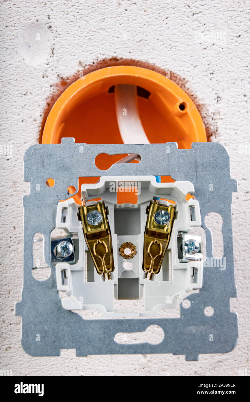 Installation of the electric socket in a rough wall. Installation of a ...
