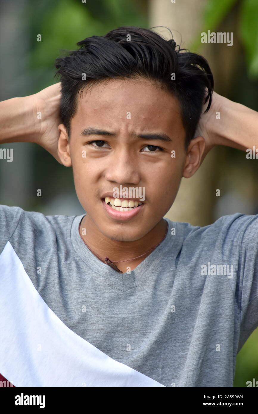 An An Anxious Teenager Boy Stock Photo - Alamy
