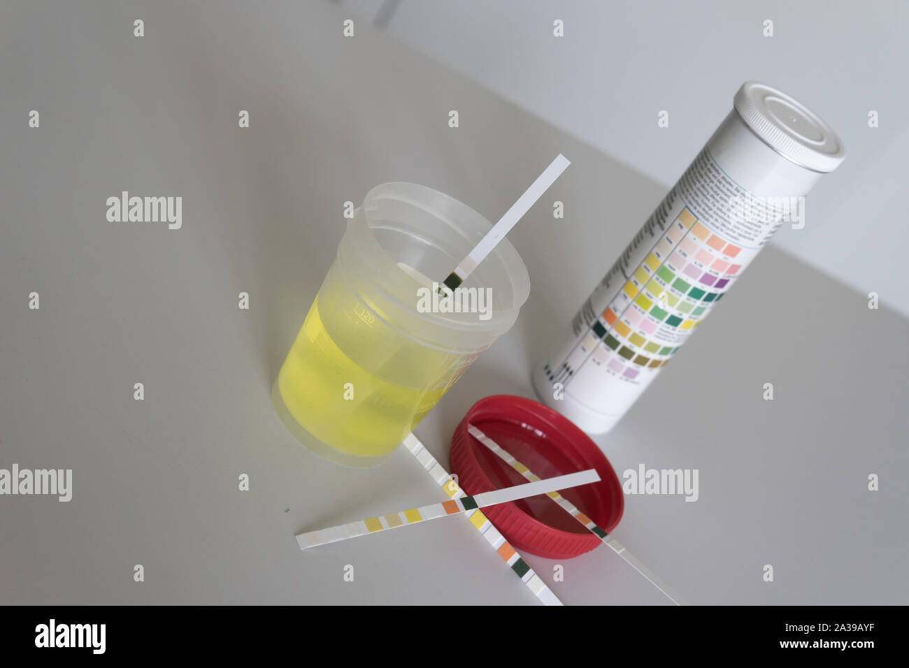 Medical exam, Urine test strip looking for infections and bacteria. Pee ...