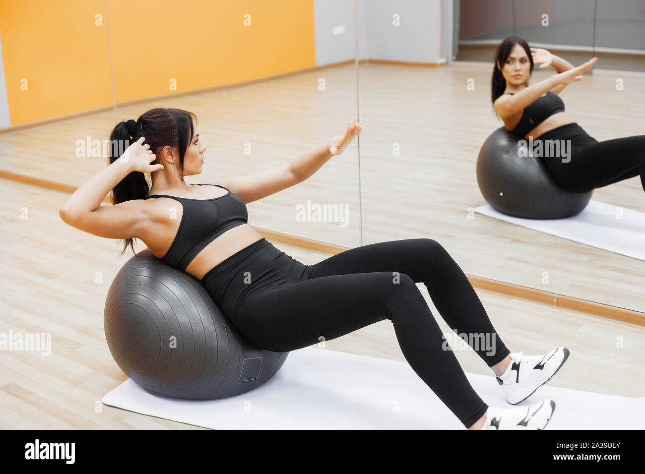 Healthy Lifestyle. Fitness woman doing exercises in gym Stock Photo - Alamy