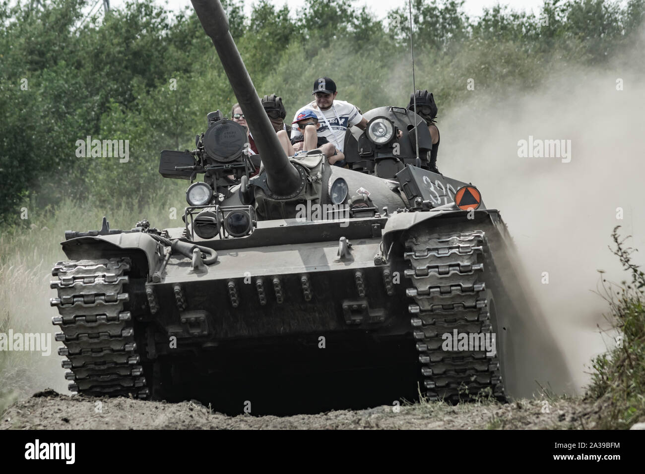 Fast ride of the Soviet T-55 tank with spectators during Military ...