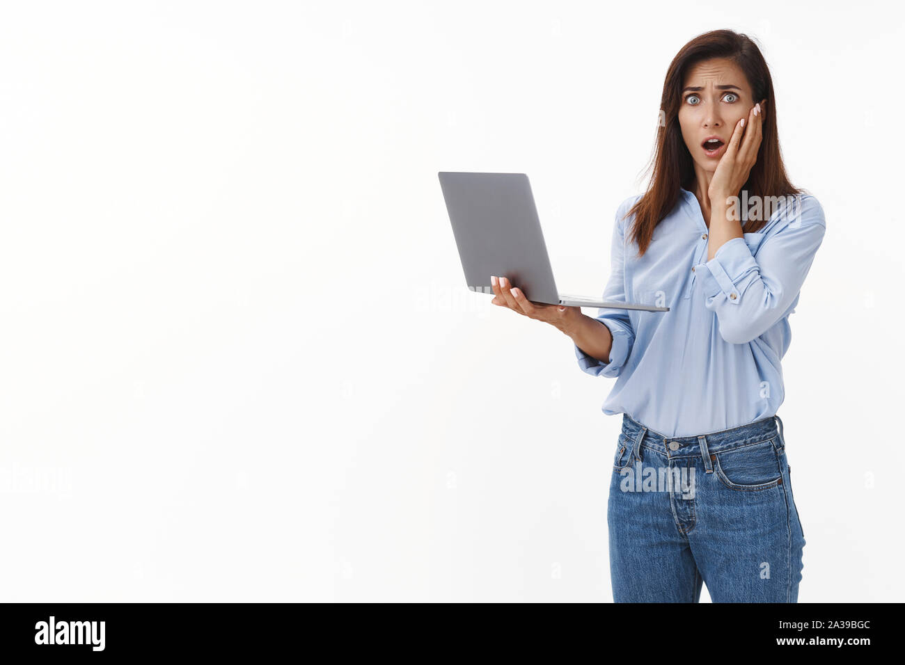 Shocked concerned brunette adult woman with tattoo, panic, stare ...