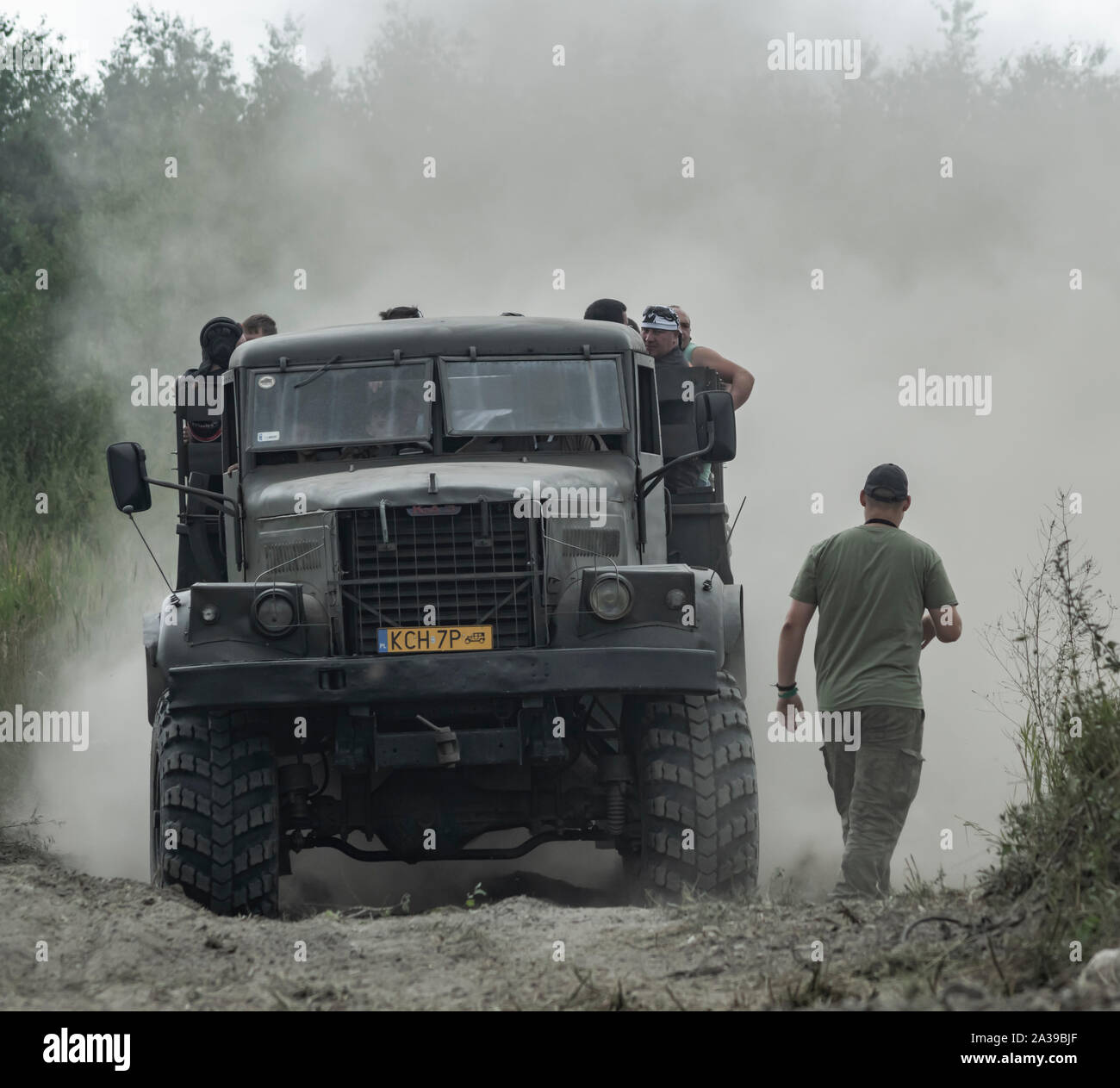 Ride of the Soviet heavy utility truck KrAZ-255 6x6 with spectators ...