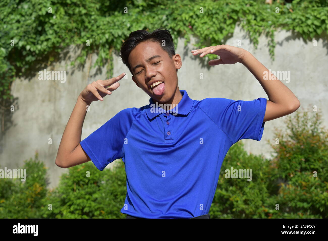 A Confused Young Filipino Teenage Male Stock Photo - Alamy