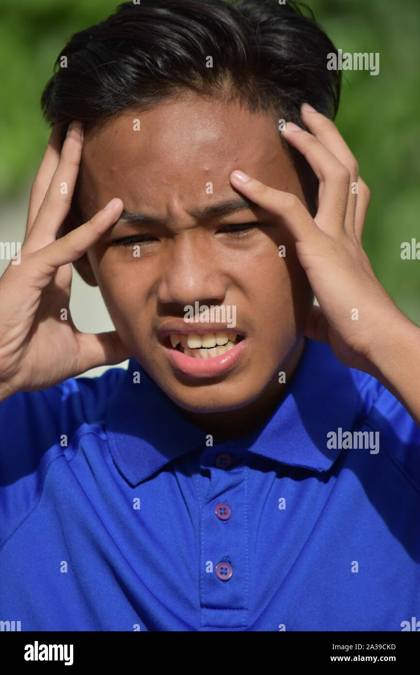 An A Stressed Teenager Boy Stock Photo - Alamy