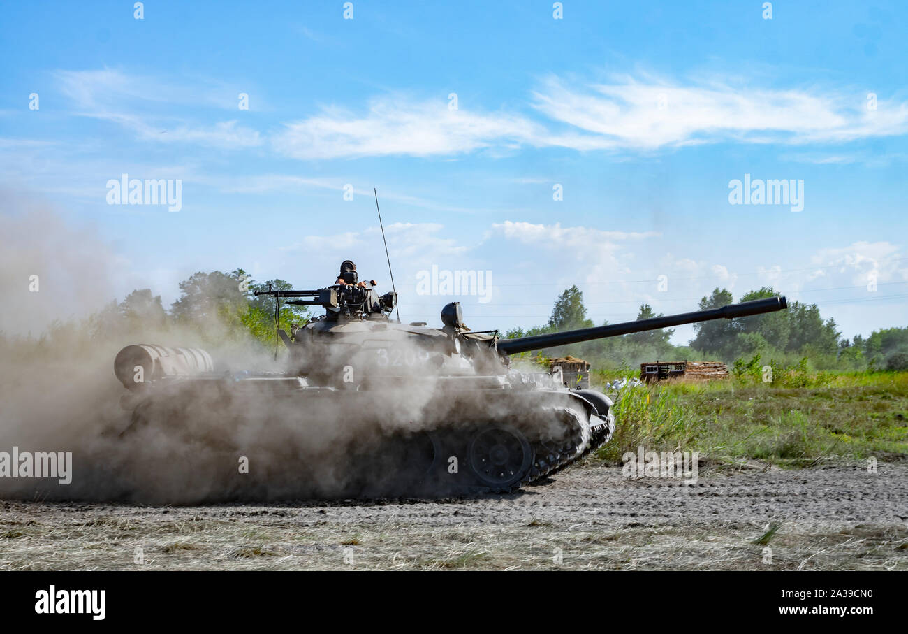 Fast ride of the Soviet T-55 tank during Military Vehicles Rally ...