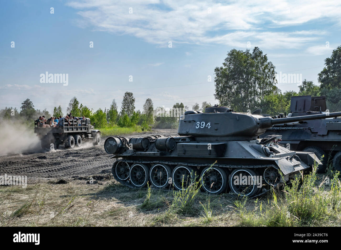 Soviet T-34 tank and heavy utility truck KrAZ-255 6x6 during Military ...