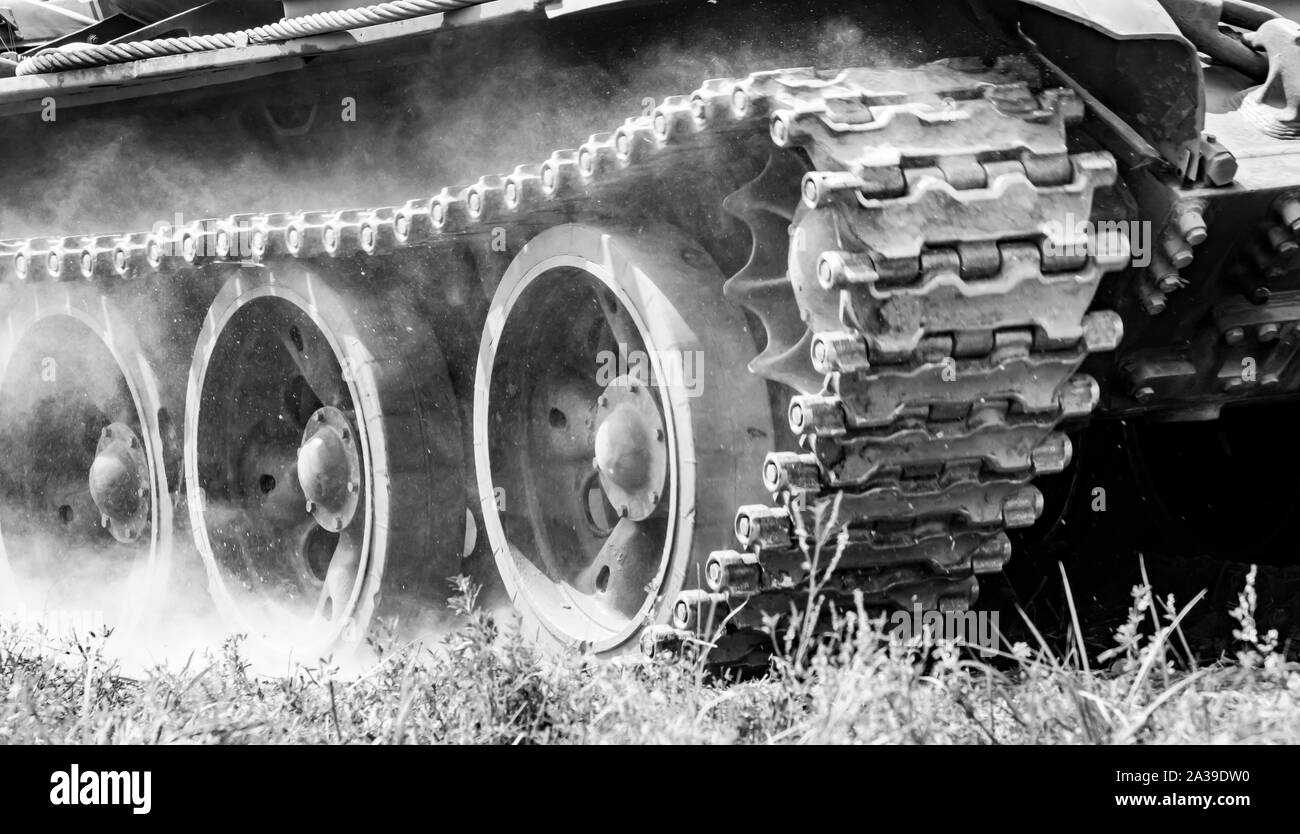 Tracks of a fast-moving tanke Soviet T-55 tank during Military Vehicles ...
