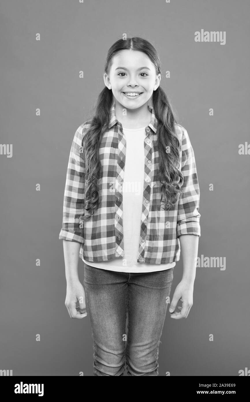 Simply being around. small girl checkered shirt. happy child. happy ...