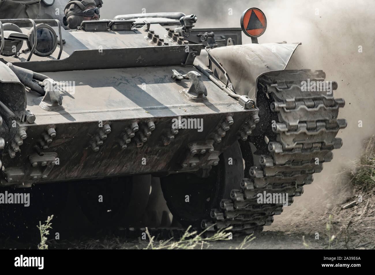 Tracks of a fast-moving tanke Soviet T-55 tank during Military Vehicles ...