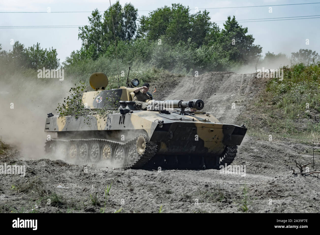 Fast ride of the Soviet 2S1 Gvozdika self-propelled howitzer during ...