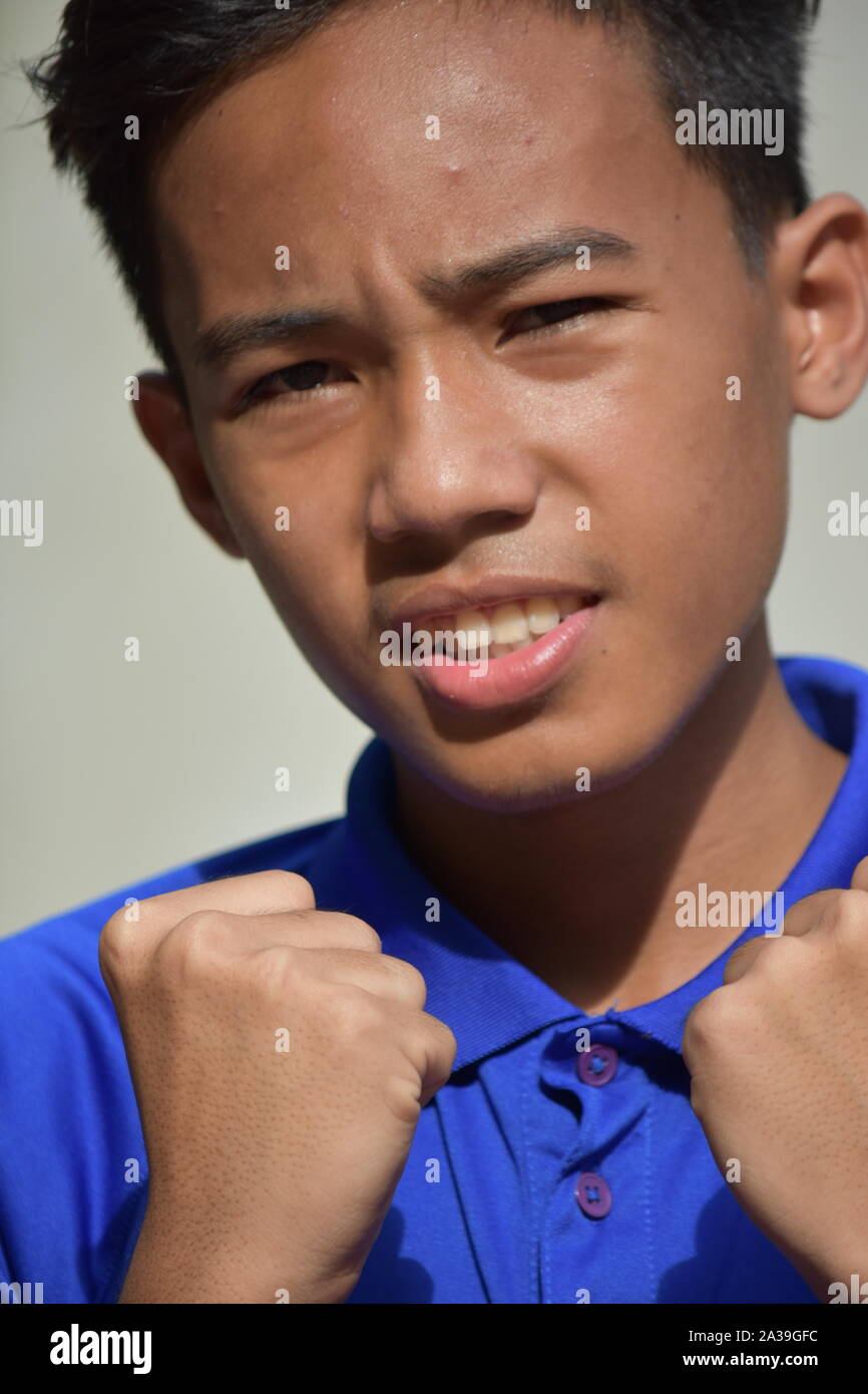 An An Angry Teenager Boy Stock Photo - Alamy