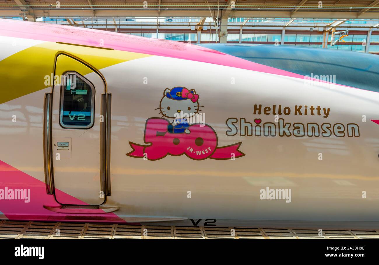 Hello kitty advertising on high speed train shinkansen on platform hi ...