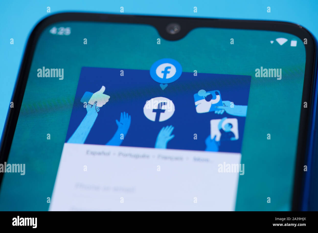 Facebook logo on mobile phone hi-res stock photography and images - Alamy