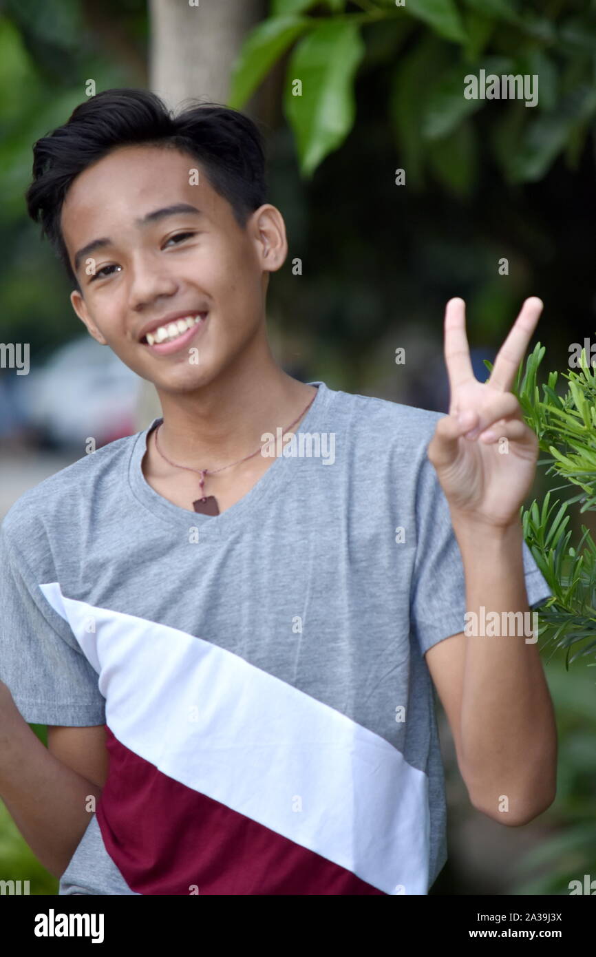 A Diverse Male And Peace Sign Stock Photo - Alamy