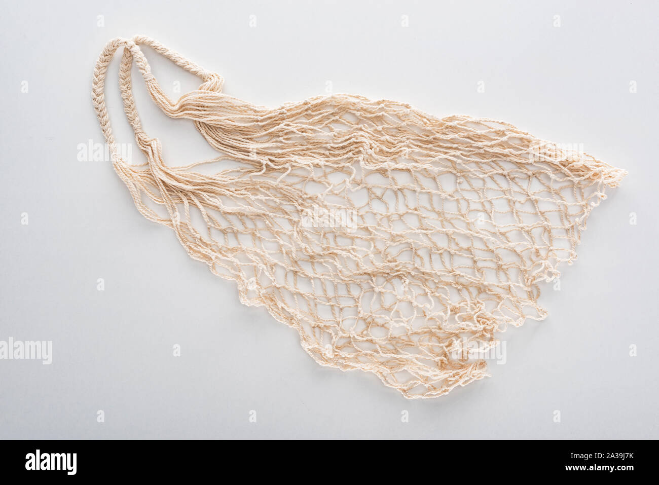 top view of empty beige eco friendly string bag isolated on white Stock ...