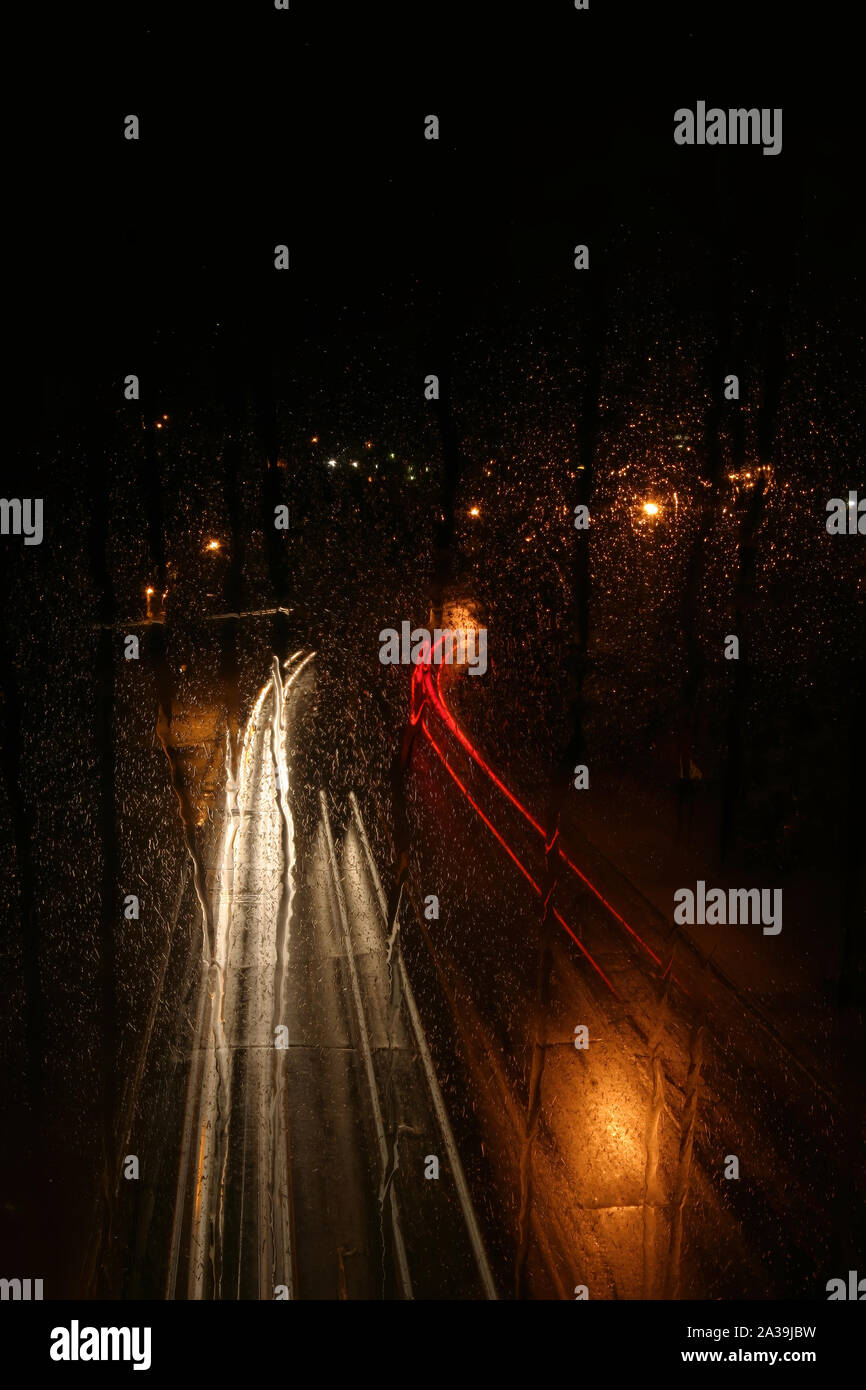 A long exposure on a rainy night in Ann Arbor, Michigan illum Stock ...