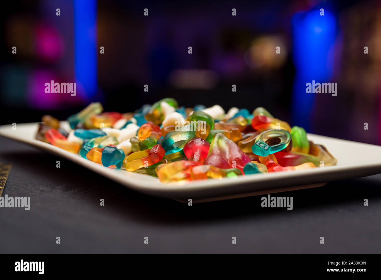 Gummy sweets on white plate hi-res stock photography and images - Alamy