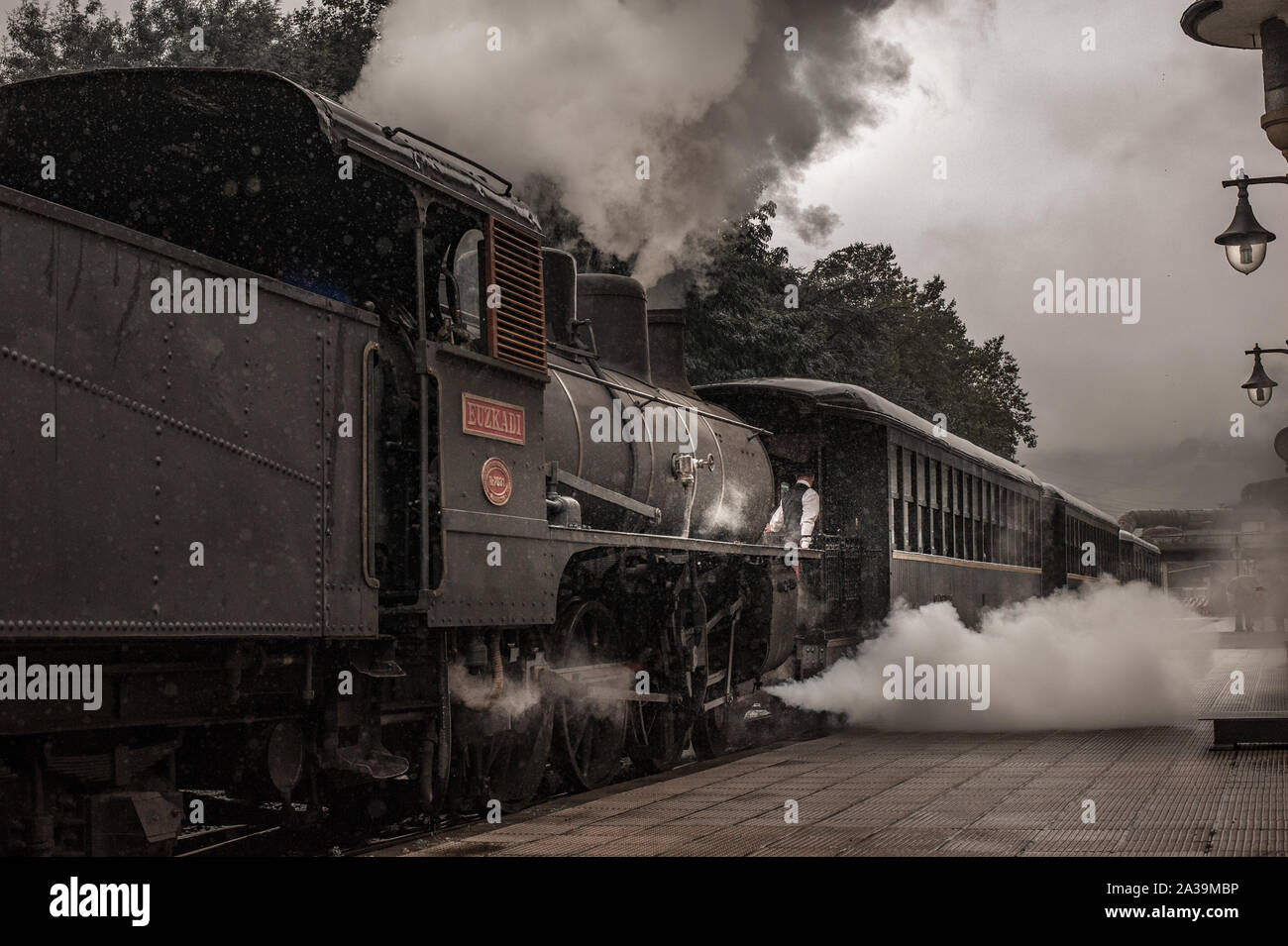 Puffing thick smoke hi-res stock photography and images - Alamy