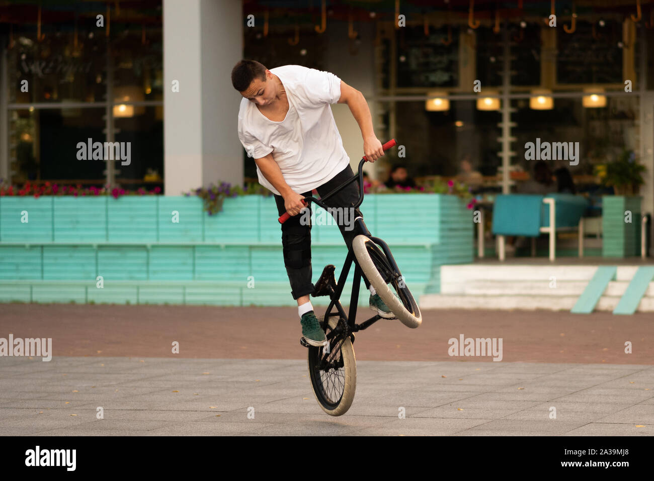 The guy on the stunt bike does the twist of the wheel and does the ...