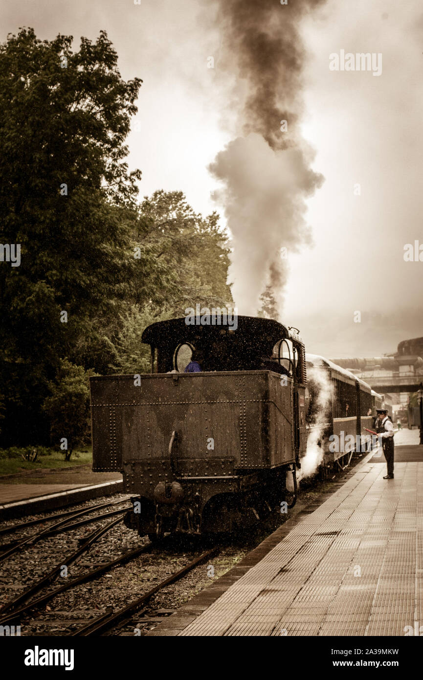 Puffing thick smoke hi-res stock photography and images - Alamy