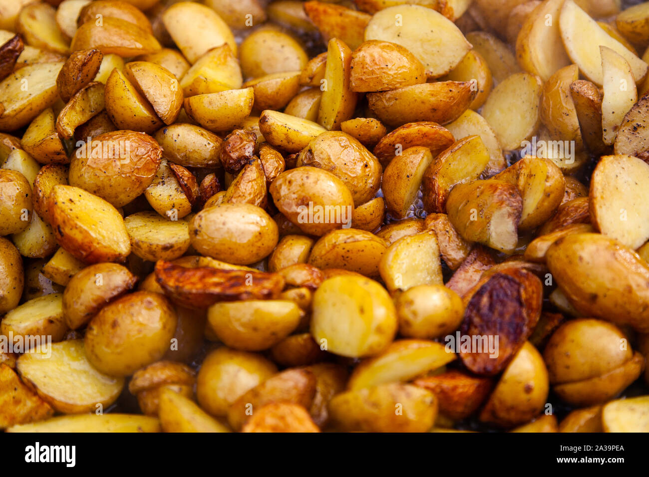 Rustic fried potatoes. Close up background concept Stock Photo - Alamy