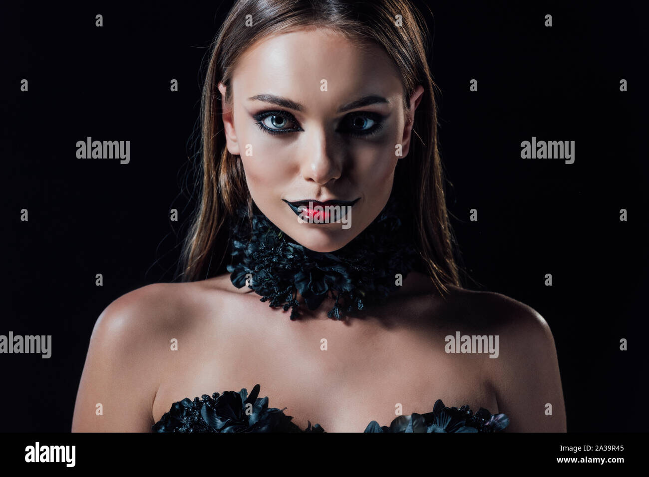 scary vampire girl in black gothic dress isolated on black Stock Photo ...