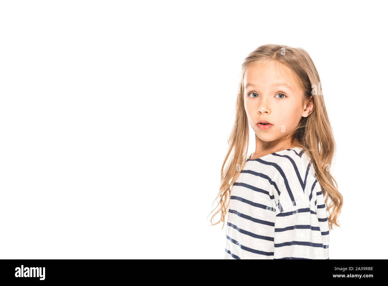 surprised kid in casual outfit looking at camera isolated on white ...