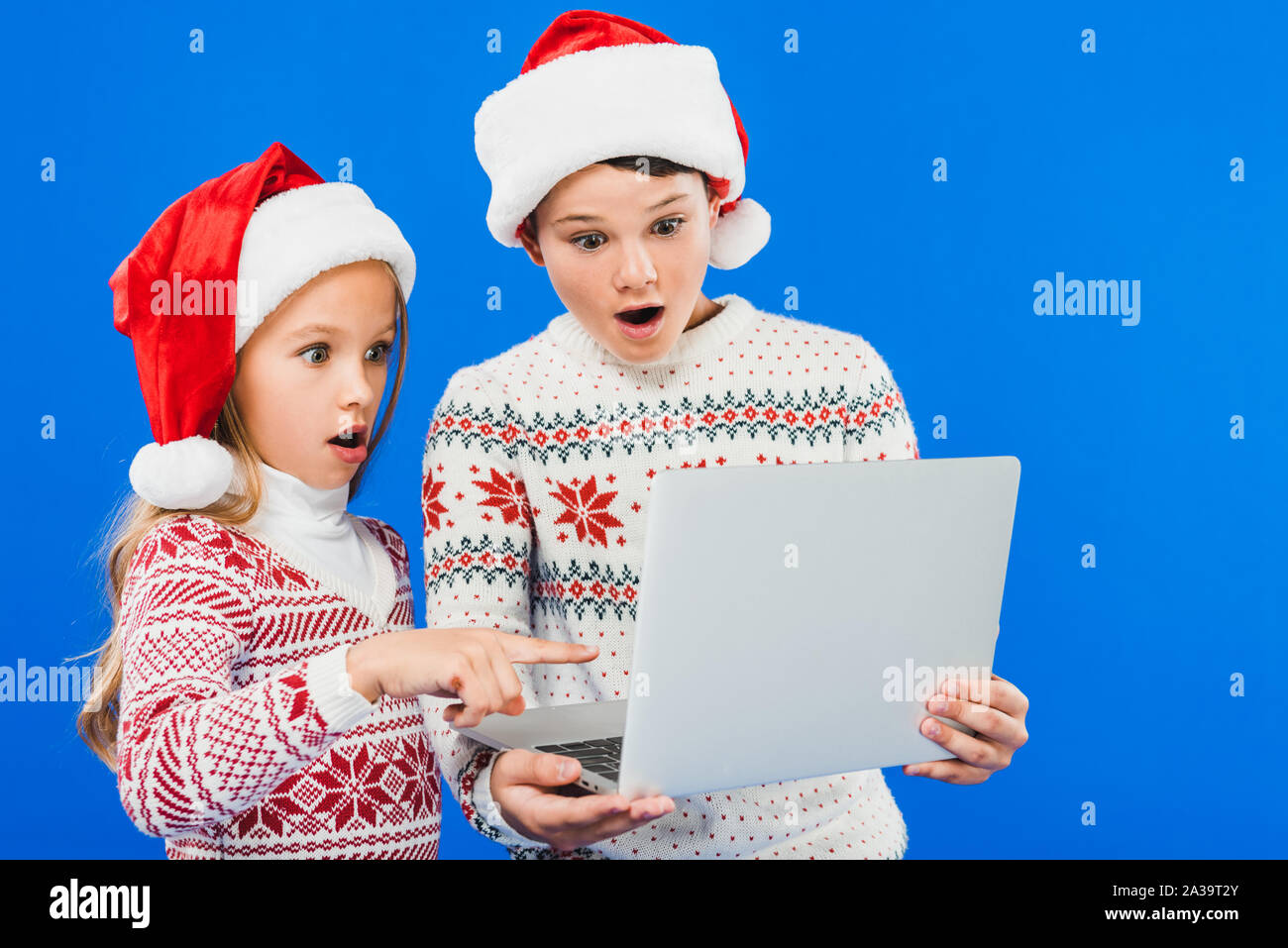 Children on computer shocked hi-res stock photography and images - Alamy