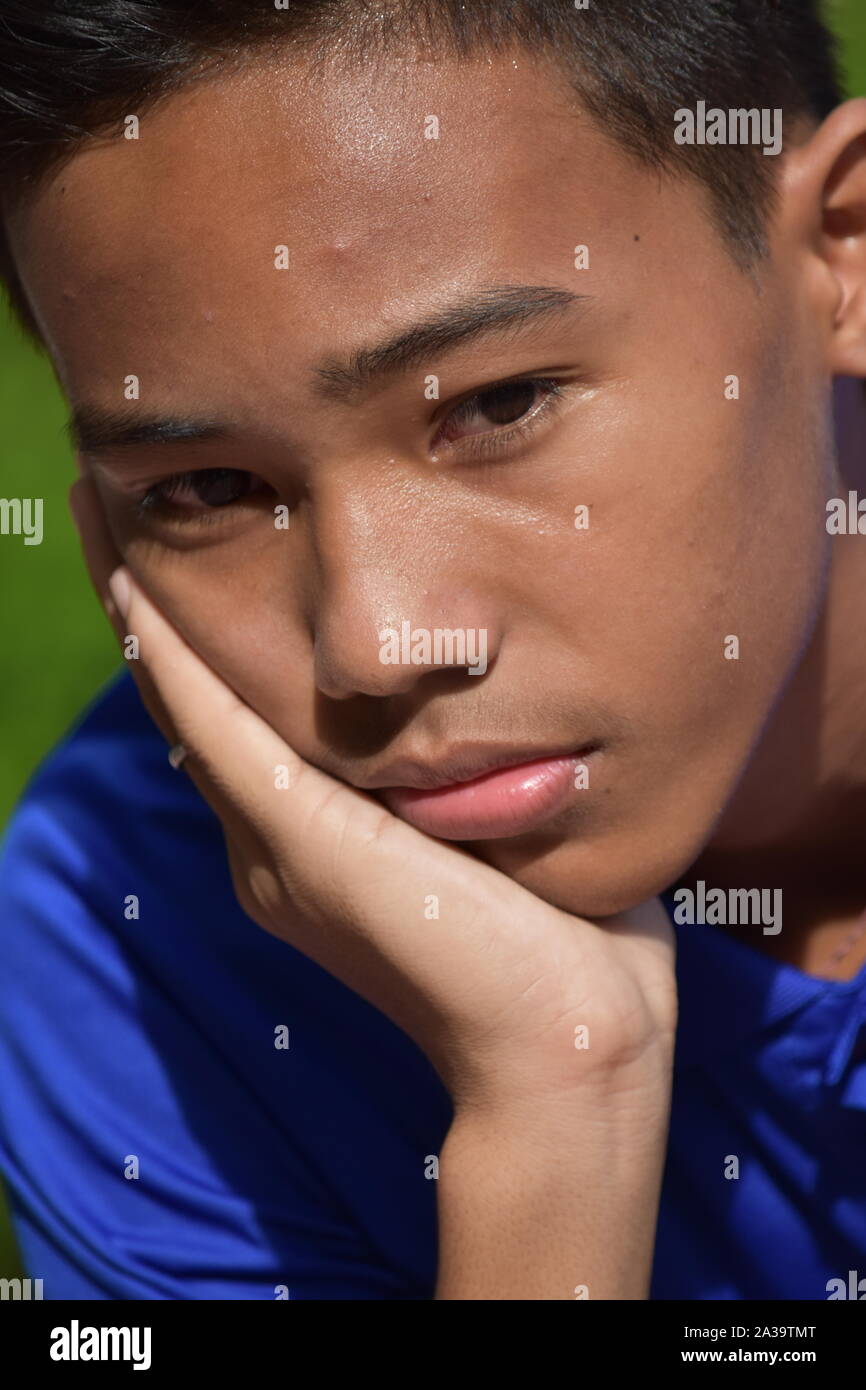 A Filipino Teenager Boy And Sadness Stock Photo - Alamy