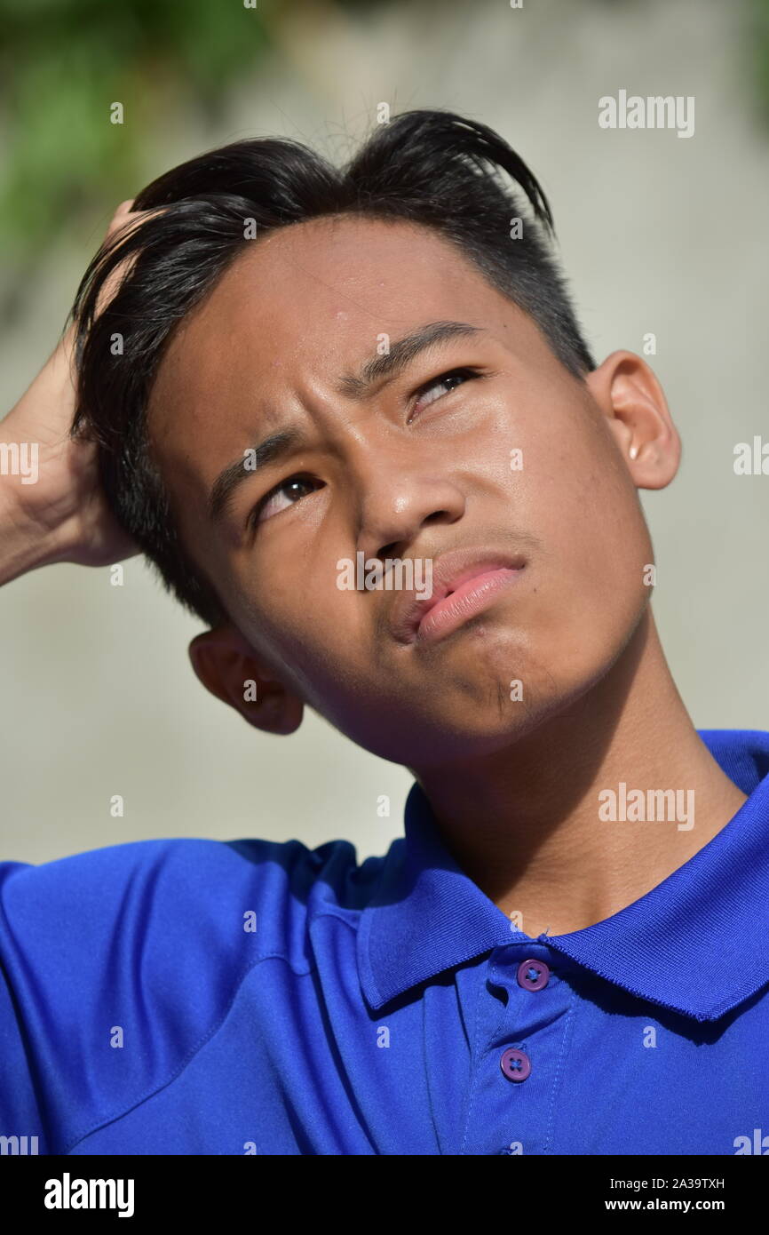 Confused adolescent hi-res stock photography and images - Alamy