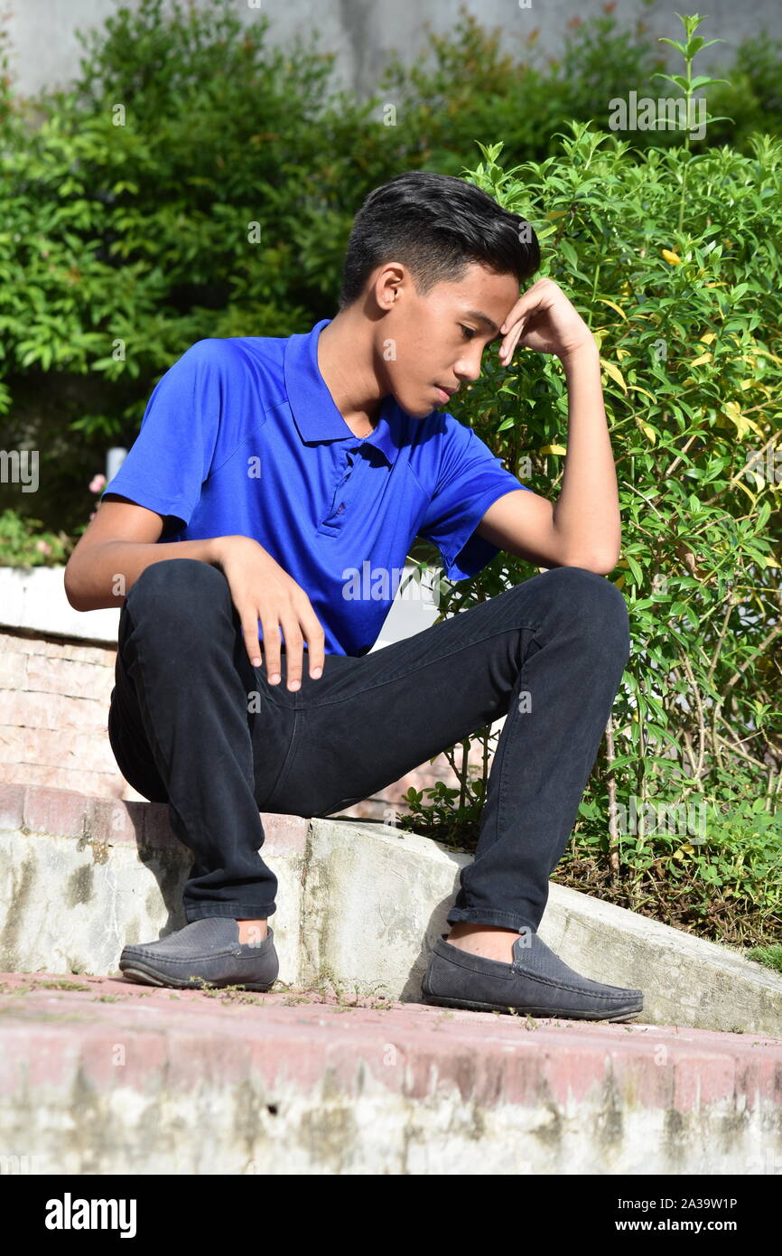 Lone teen boy hi-res stock photography and images - Alamy