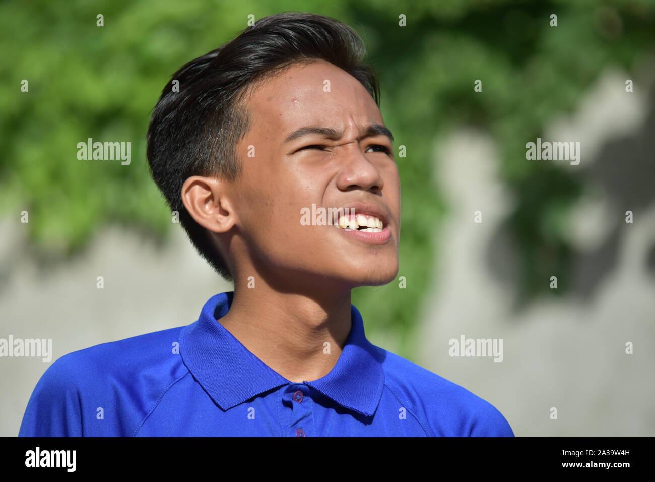 Angry boy adolescent hi-res stock photography and images - Alamy