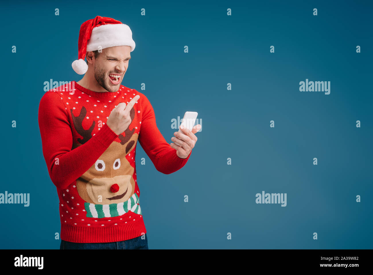 Angry santa showing middle hi-res stock photography and images - Alamy